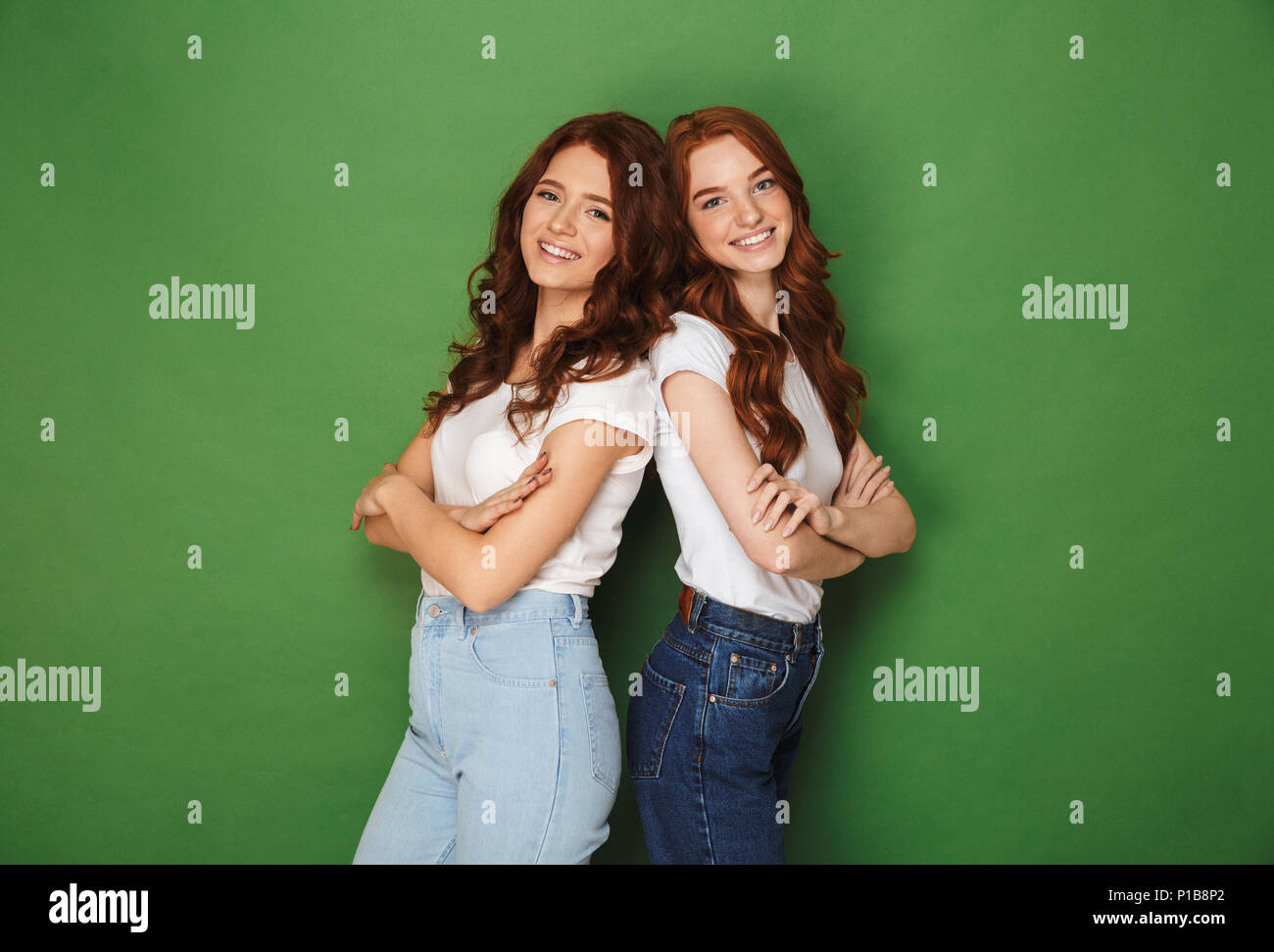 Two girls arms crossed back hi-res stock photography and images - Alamy