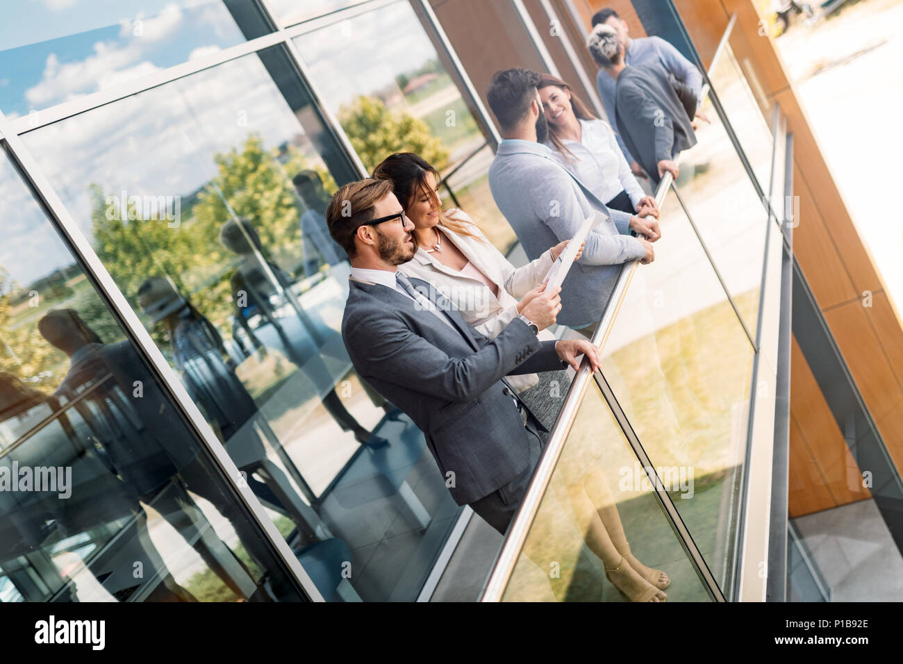 Business people talking outdoor Stock Photo - Alamy