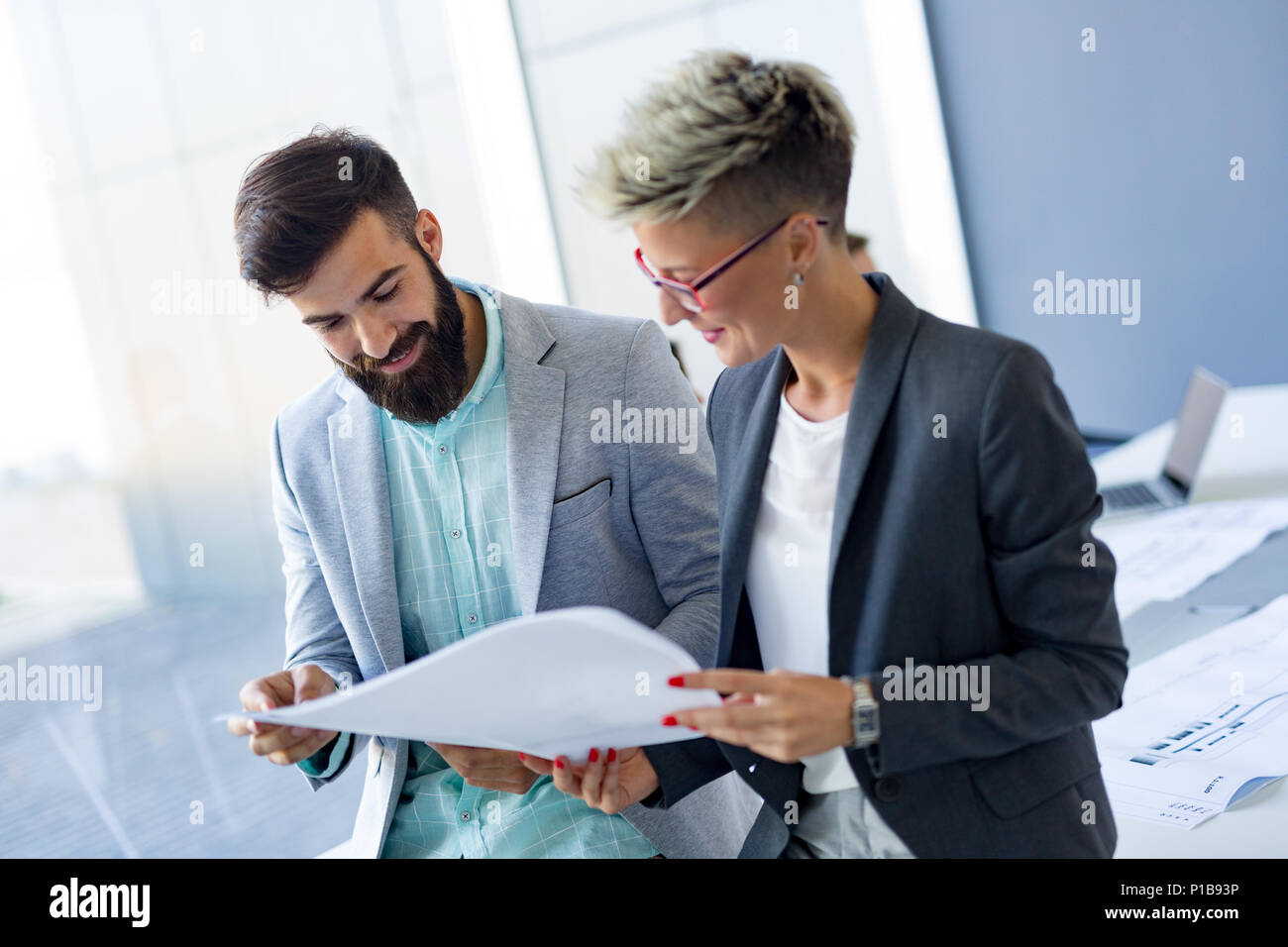 Picture of handsome man and woman as business partners Stock Photo - Alamy