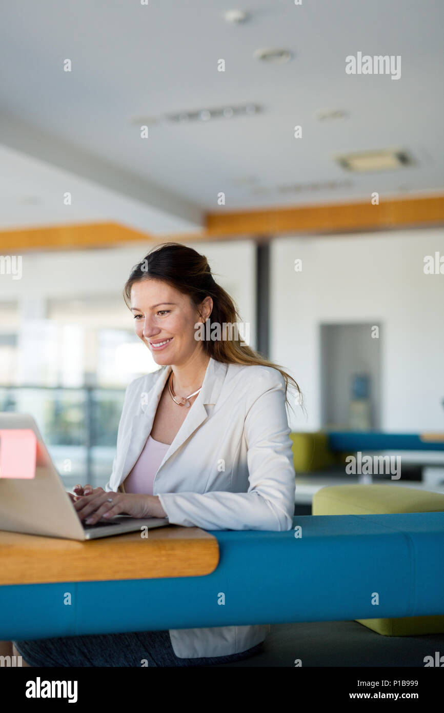 Female architect working at laptop hi-res stock photography and images ...