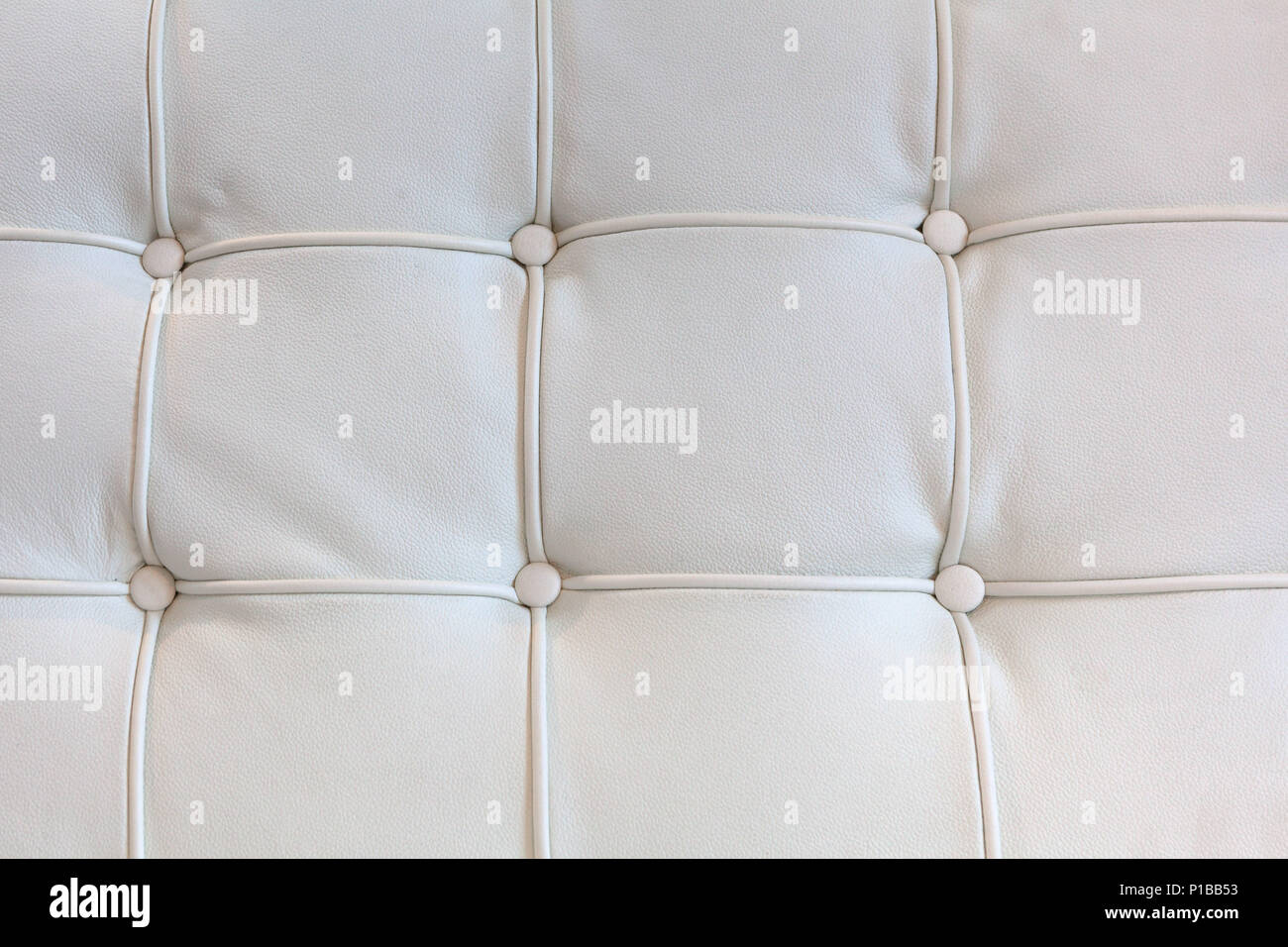 Leather sofa upholstery close-up background texture Stock Photo - Alamy