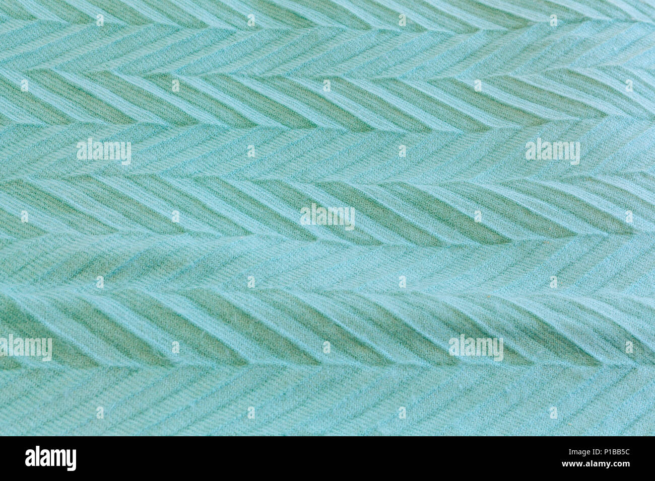 Turquoise wrinkled fabric hi-res stock photography and images - Alamy