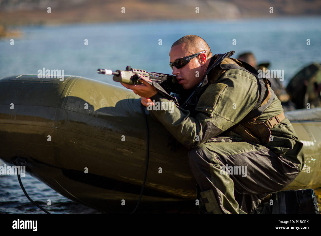 U.S. Marine Corps Lance Cpl. Benjamin King with 2nd Air Naval Gunfire ...
