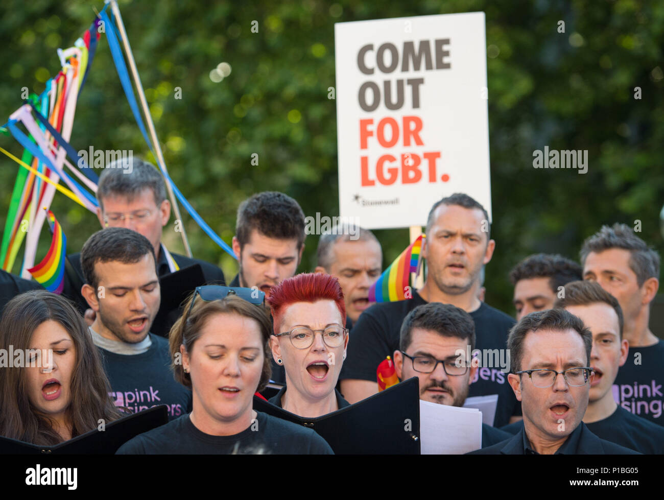 A 100-strong LGBT "super choir" sing outside Parliament ahead of a ...