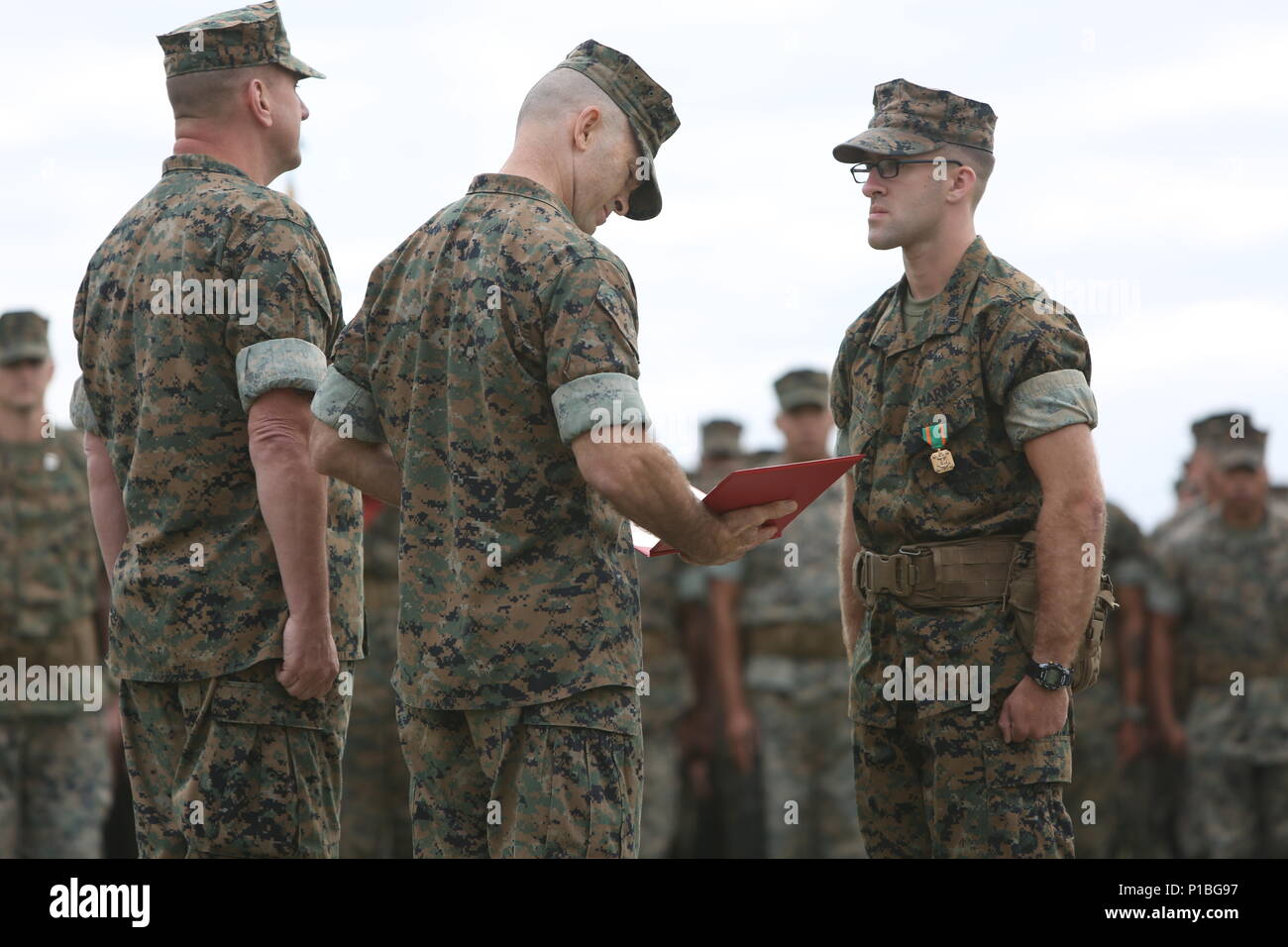 U.S. Marine Corps Maj. Gen. John K. Love, center, commanding general ...
