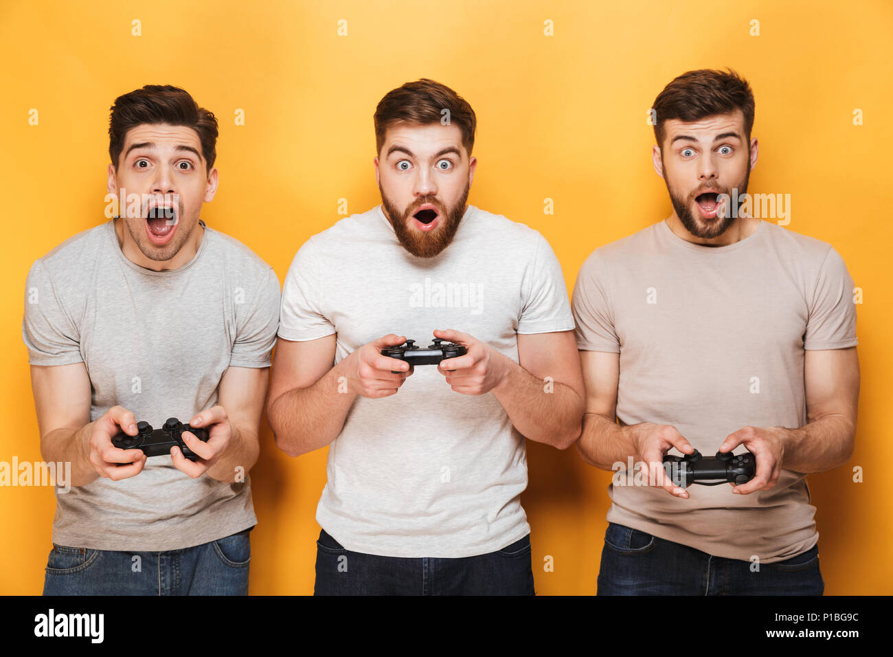 Image of excited emotional nervous young group of men friends standing ...