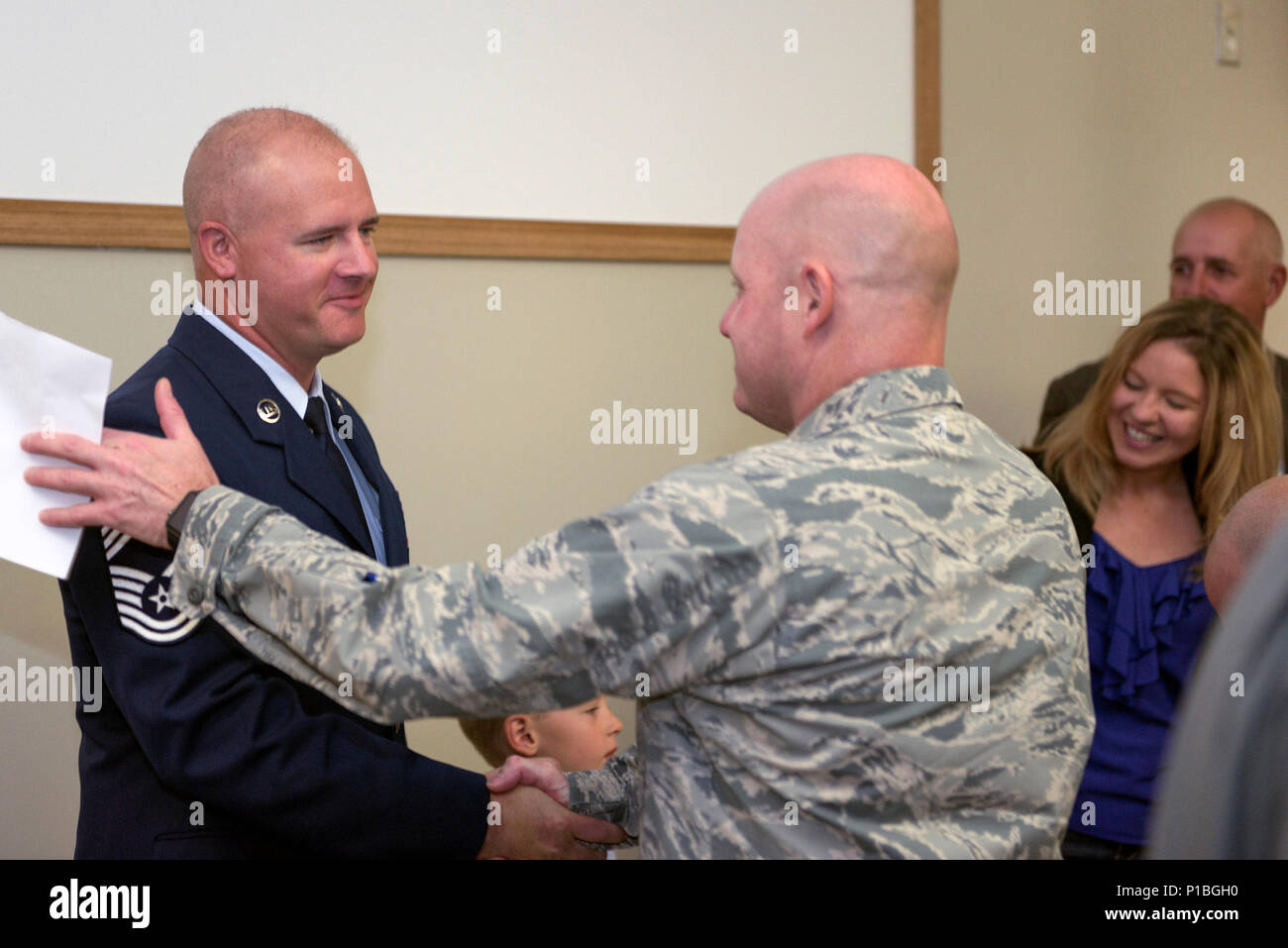 U.S. Air Force Chief Master Sgt. Clifford Otto III, left, the fire ...