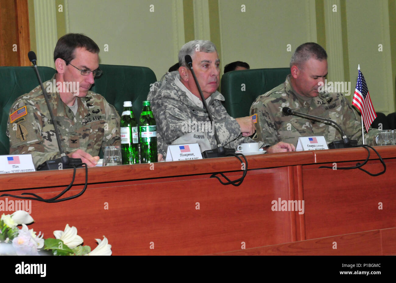 YAVORIV, Ukraine— Retired Army General John Abizaid (middle), advisor ...