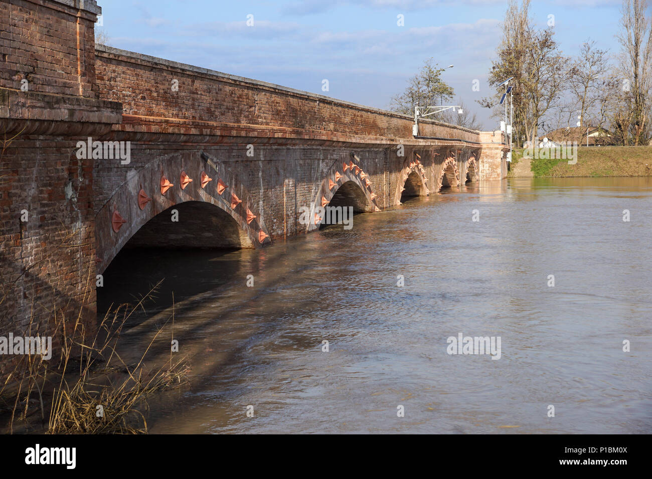 bridge with full river . River is full . Bridge to cross the river that ...