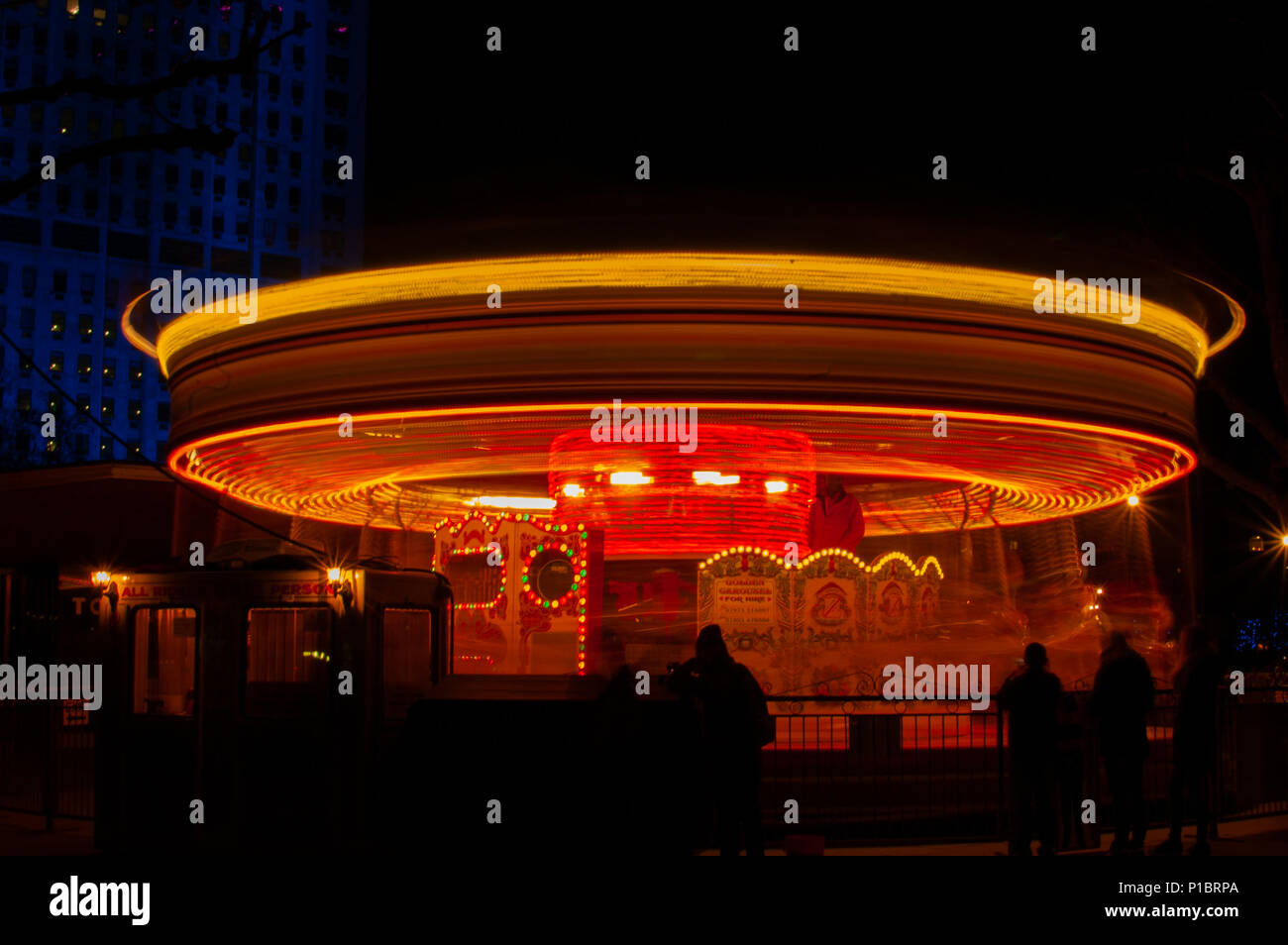 Merry go round at night Stock Photo - Alamy