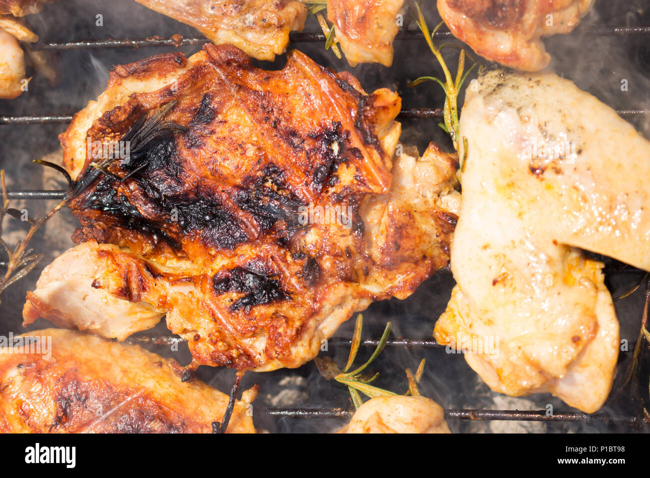 Grilled Deboned Chicken Meat On Smoking Barbecue With Rosemary Stock ...
