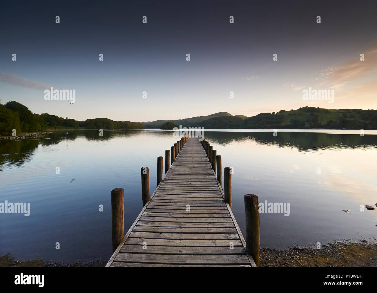 Parkmoor Jetty at dusk, Coniston Water, Lake District National Park, A ...