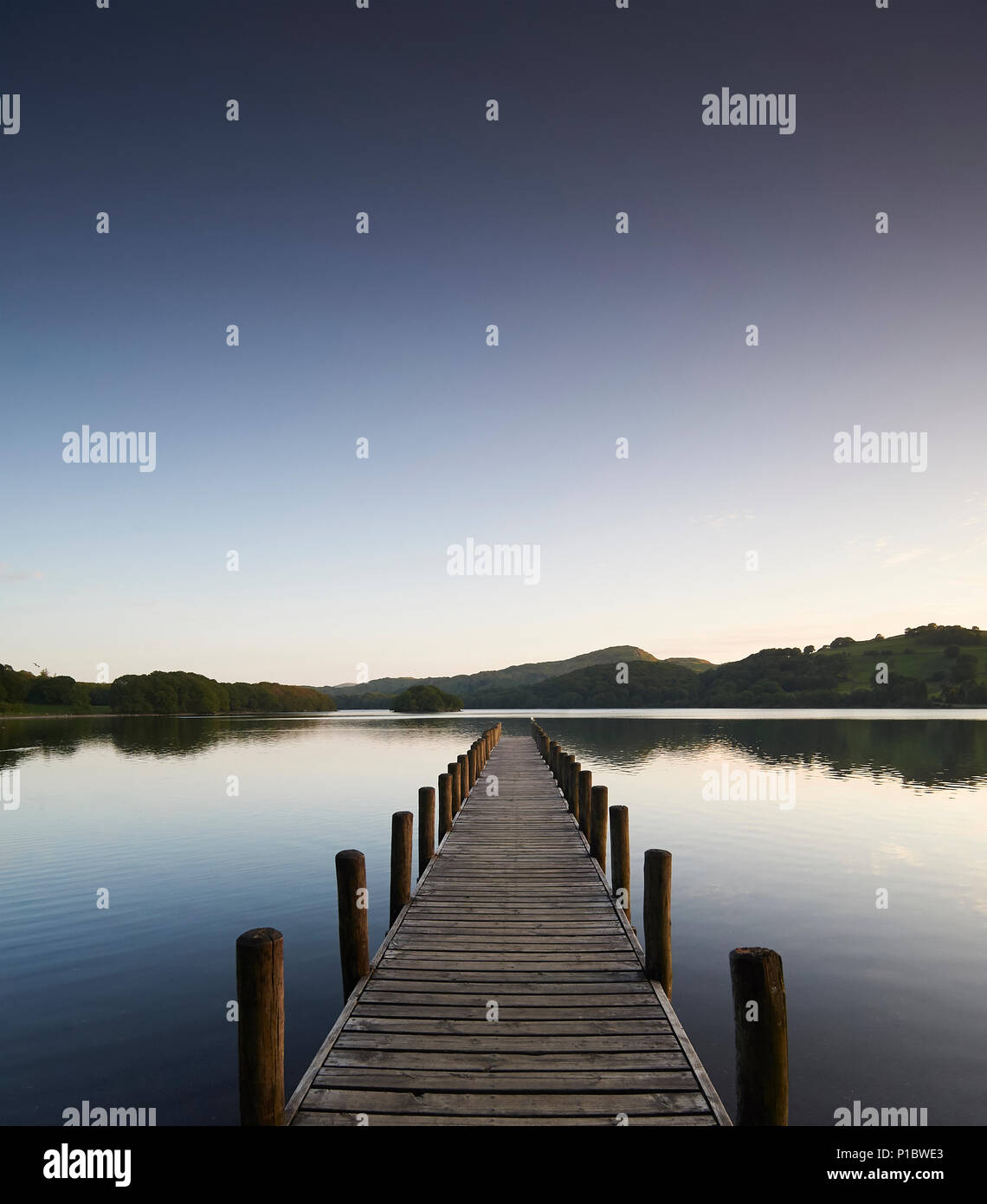 Parkmoor Jetty at dusk, Coniston Water, Lake District National Park, A ...