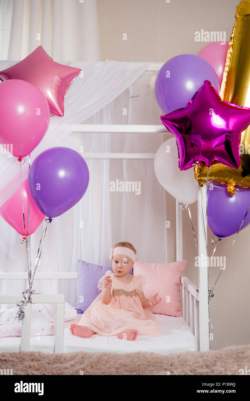 Baby in cream colors hi-res stock photography and images - Alamy