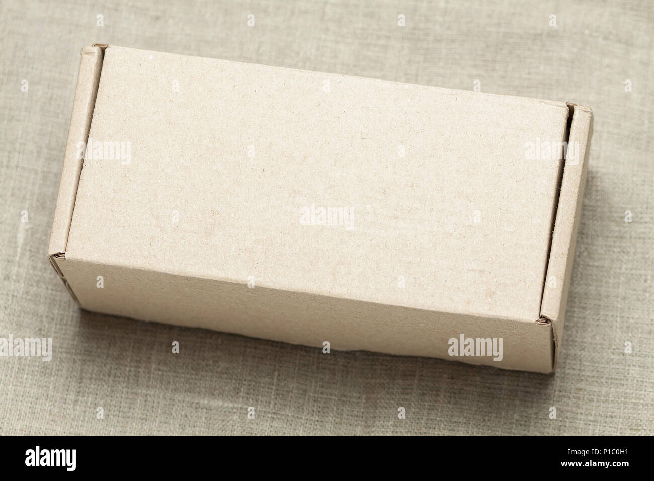 Cardboard box on linen hi-res stock photography and images - Alamy