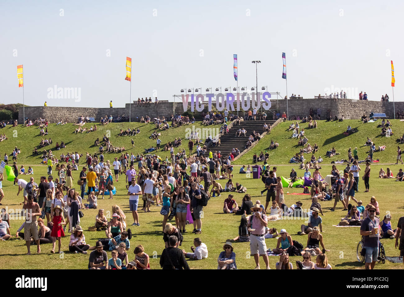 Victorious Festival landscape with people sunbathing and enjoying bands ...