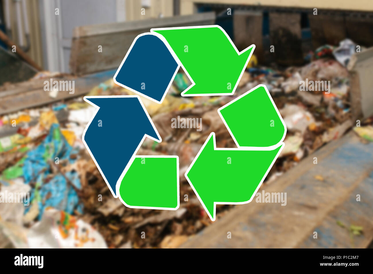 Sign recycling waste. The waste sorting and processing plant is blurry ...