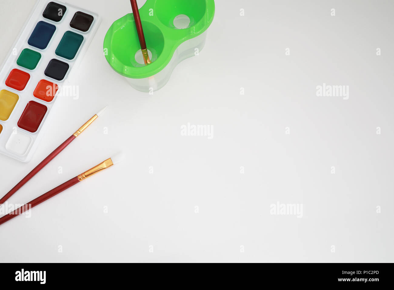 Stationery for drawing paints on a white sheet of paper Stock Photo - Alamy