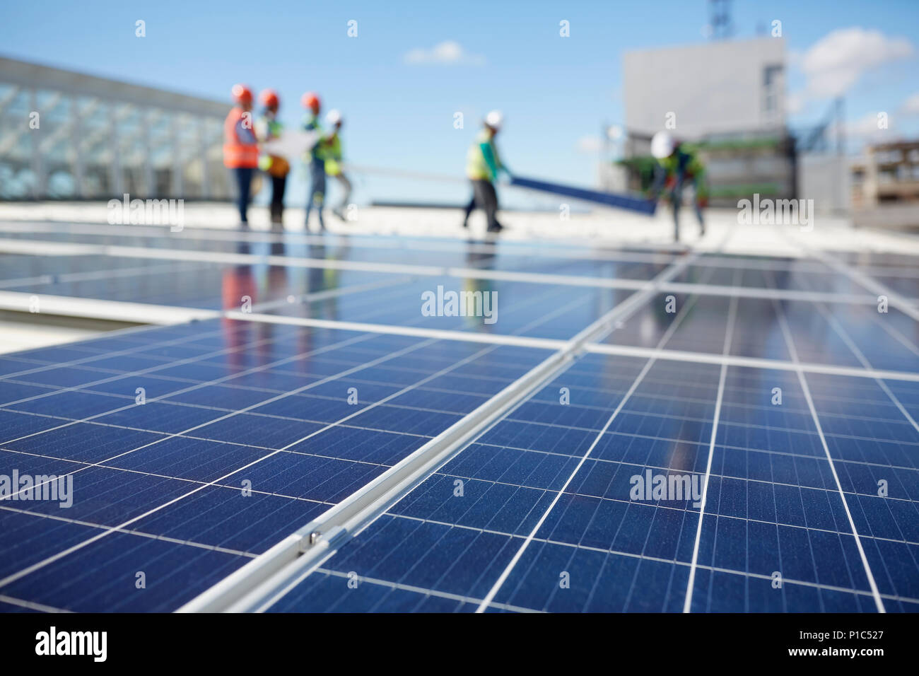 Solar panels at sunny power plant Stock Photo - Alamy