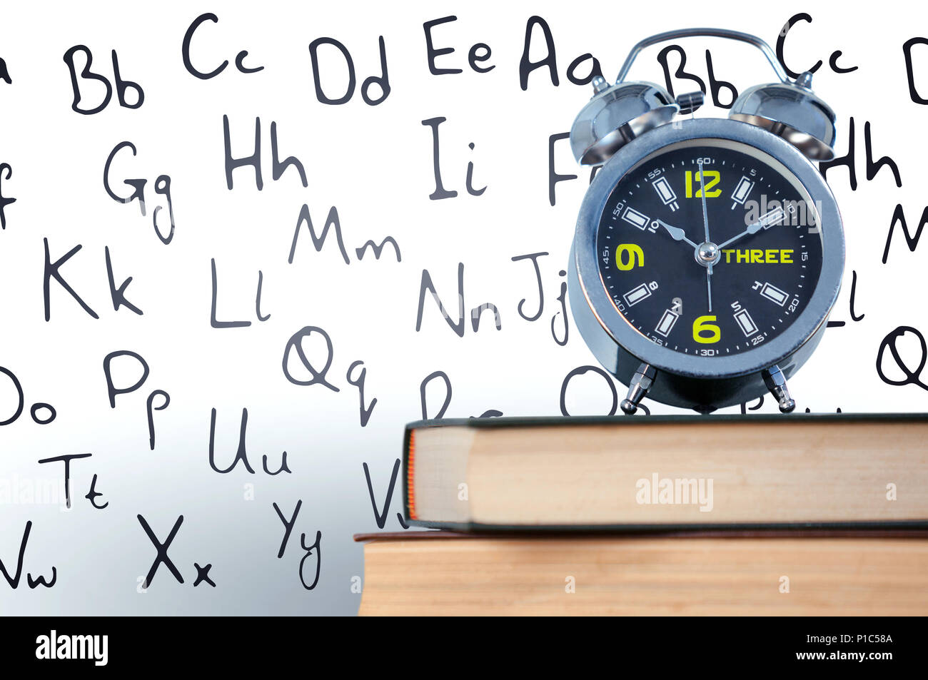 Old alarm clock on old books hi-res stock photography and images - Alamy