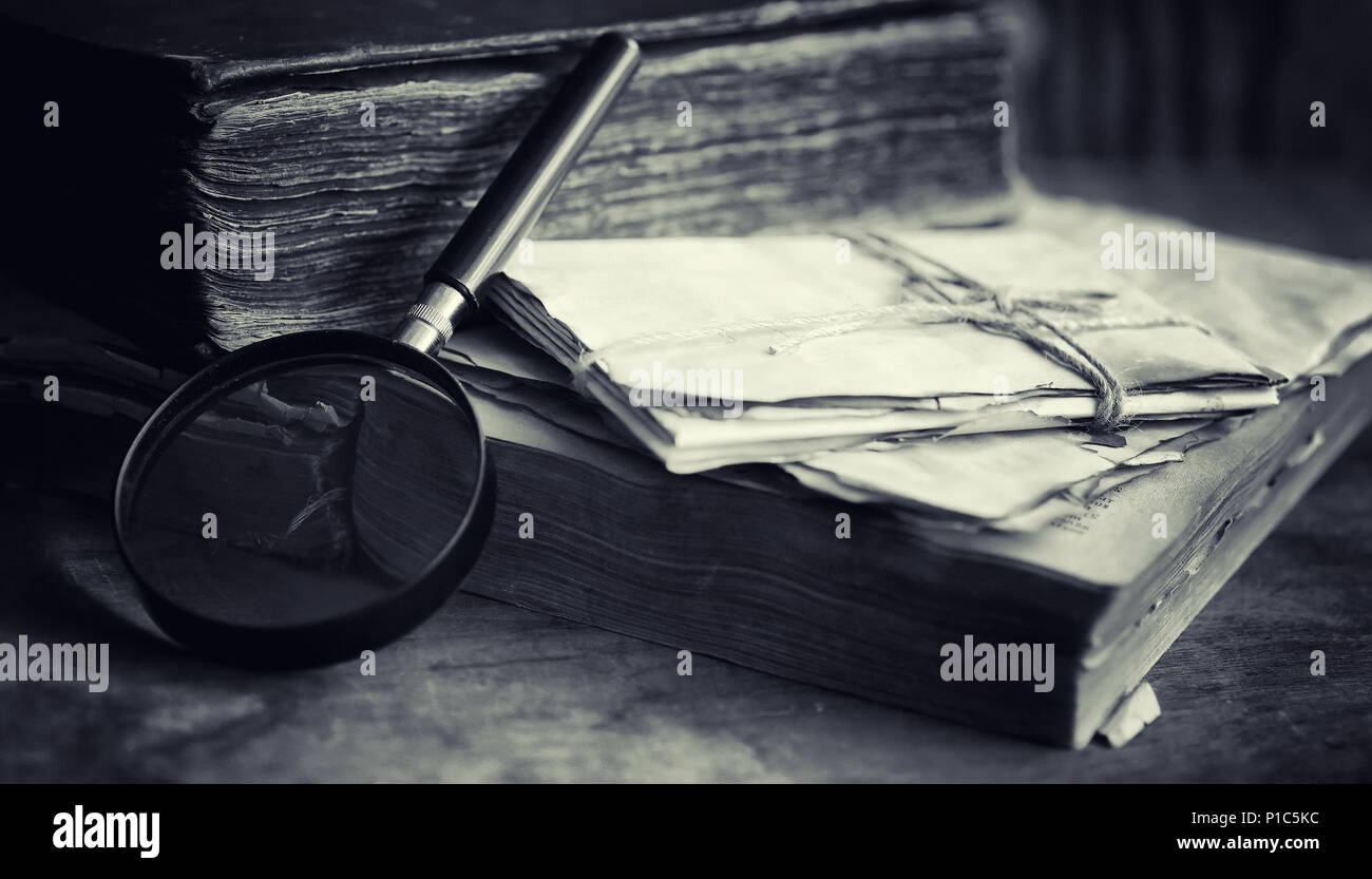 An old retro book on the table. An encyclopedia of the past on a Stock ...