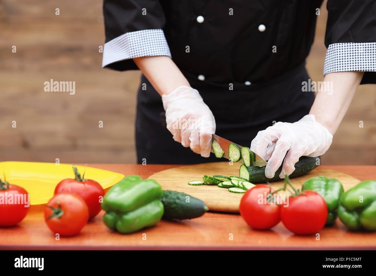 Knife cuts cucumber slicing vegetables hi-res stock photography and ...