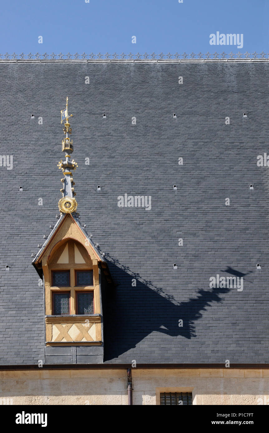"Hotel Dieu" slate roof with dormer window and weather vane and spires ...