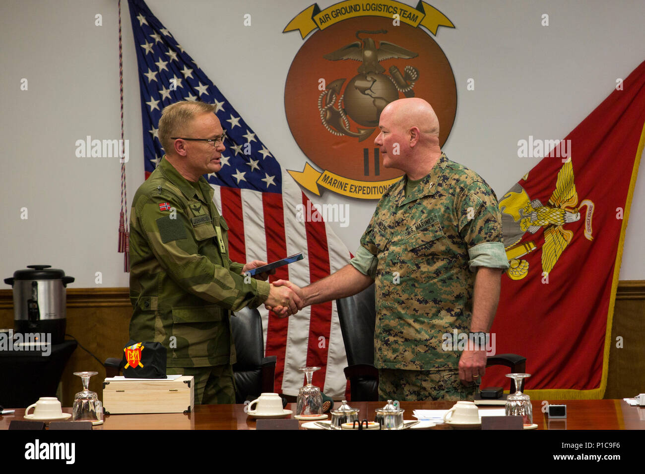 Major Gen. Odin Johannessen and Maj. Gen. Walter L. Miller exchange ...