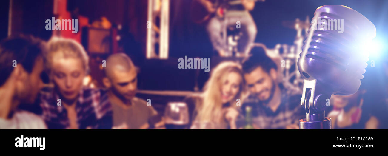 Singer using microphone hi-res stock photography and images - Alamy