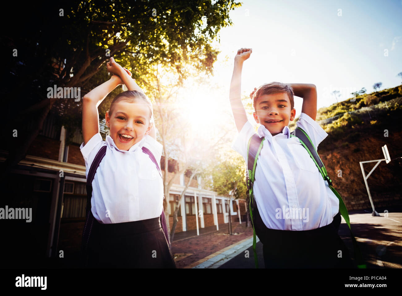 School kids having a fun in campus Stock Photo - Alamy