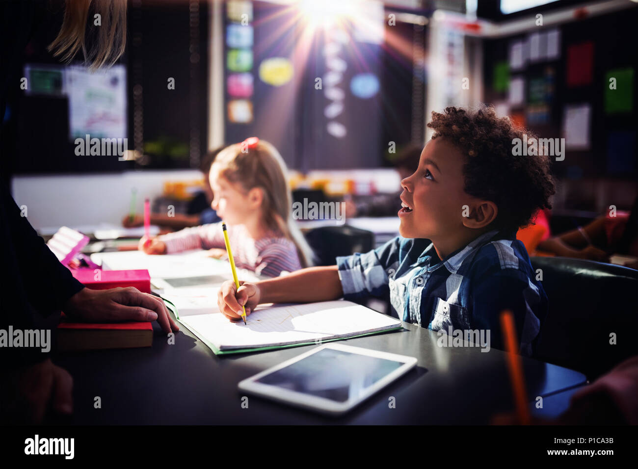Teacher interacting student hi-res stock photography and images - Alamy Teacher interacting student hi-res stock photography and images - Alamy