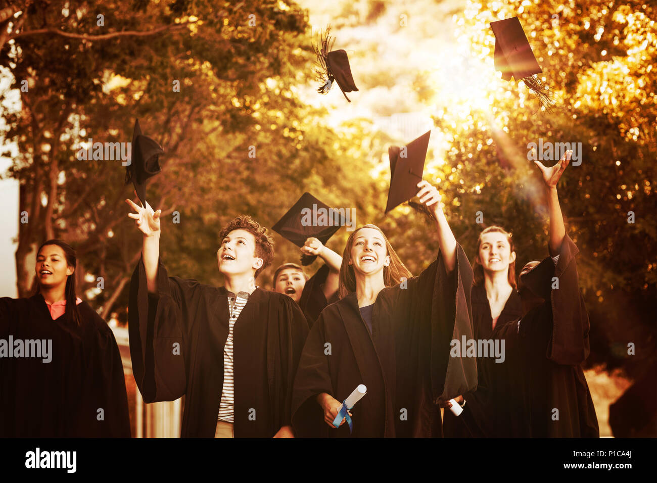 Students celebrating their graduation Stock Photo - Alamy
