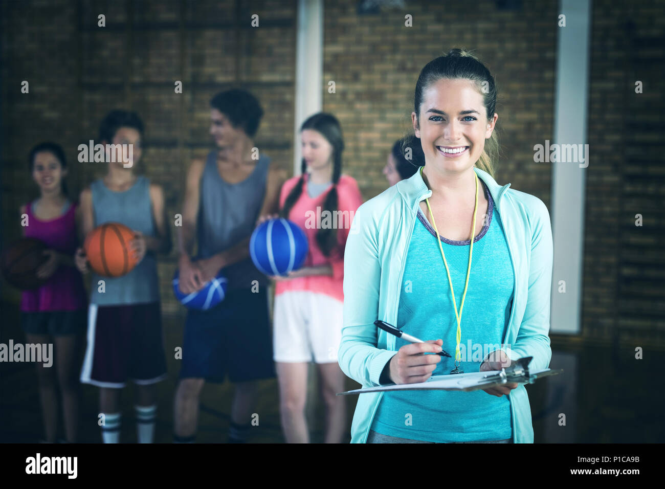 Happy coach standing hi-res stock photography and images - Alamy