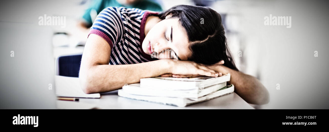 Student sleeping in the library Stock Photo - Alamy