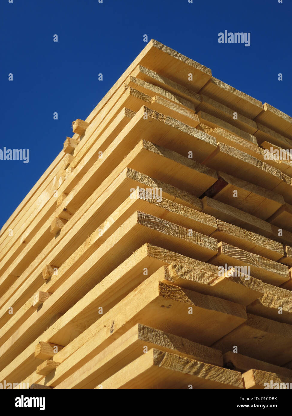 Stack of new wooden boards at the lumber yard Stock Photo - Alamy