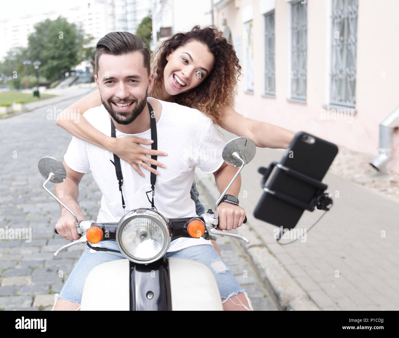 Two men on moped riding hi-res stock photography and images - Alamy