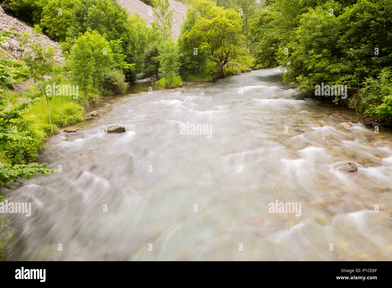 Waterfall in the Cares River located in the Picos de Europa National ...