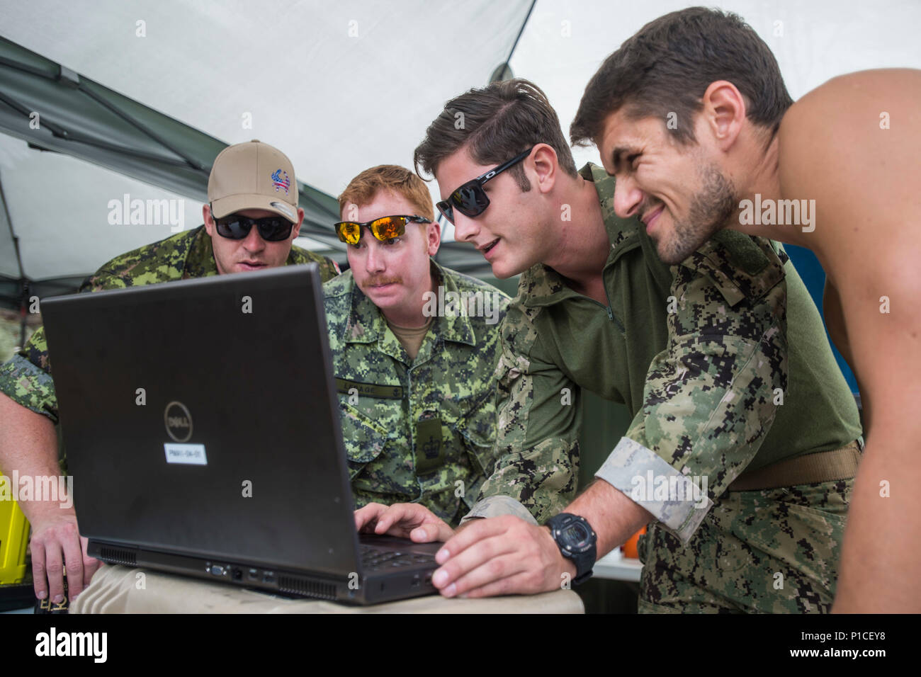 Lt. j.g. Jonathon Ferris, assigned to Explosive Ordnance Disposal ...