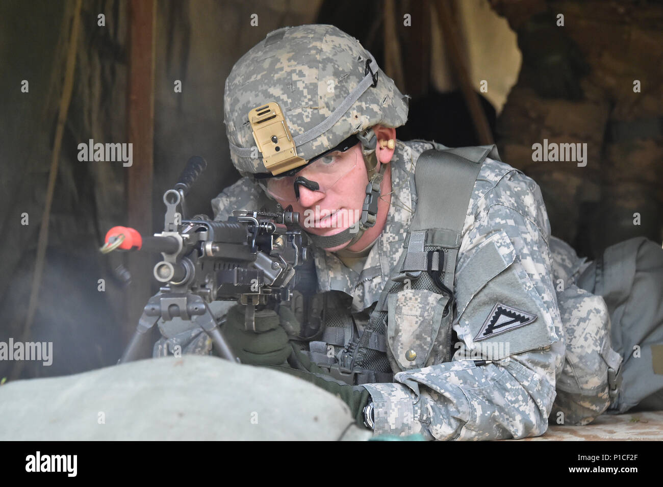 U.S. Army Spc. Samuel Miller, assigned to Company B, 1st Battalion, 4th ...