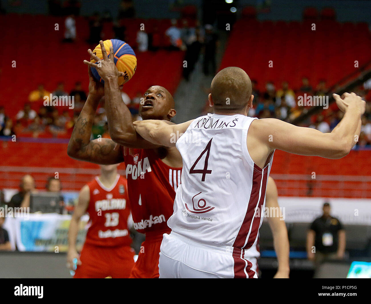 Bulacan, Philippines. 12th June, 2018. Michael Hicks of Poland (L ...