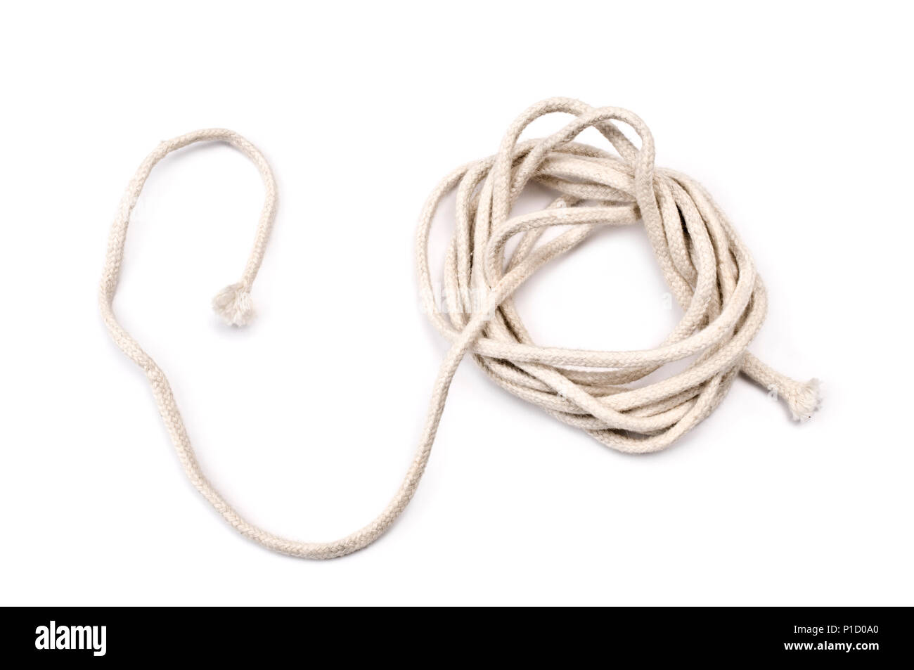 Tangled rope on white background Stock Photo - Alamy