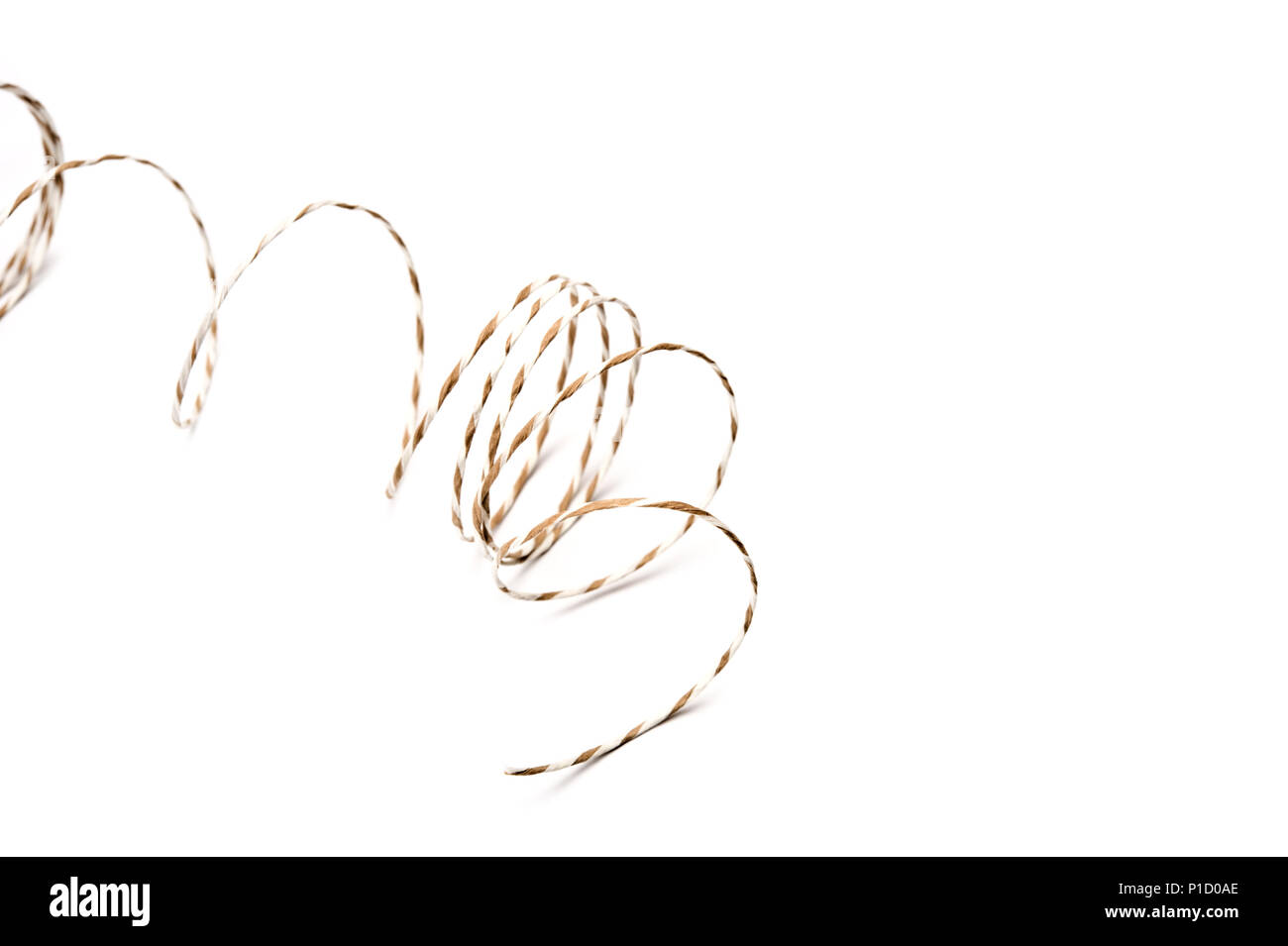 String coils on white background Stock Photo - Alamy