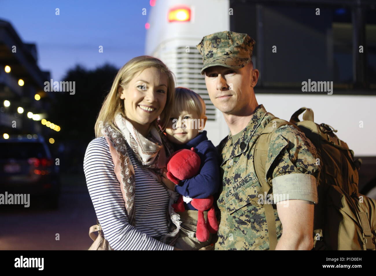 Master Sgt. Lee Moffett embraces family during a deployment homecoming ...