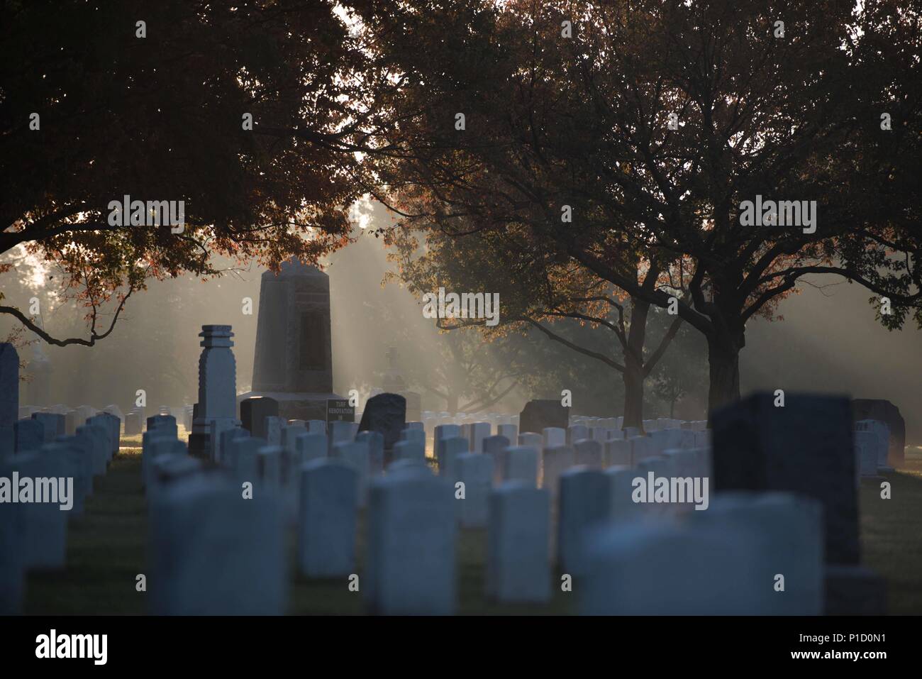 The low rising sun coupled with the fall colors of the trees blanket ...