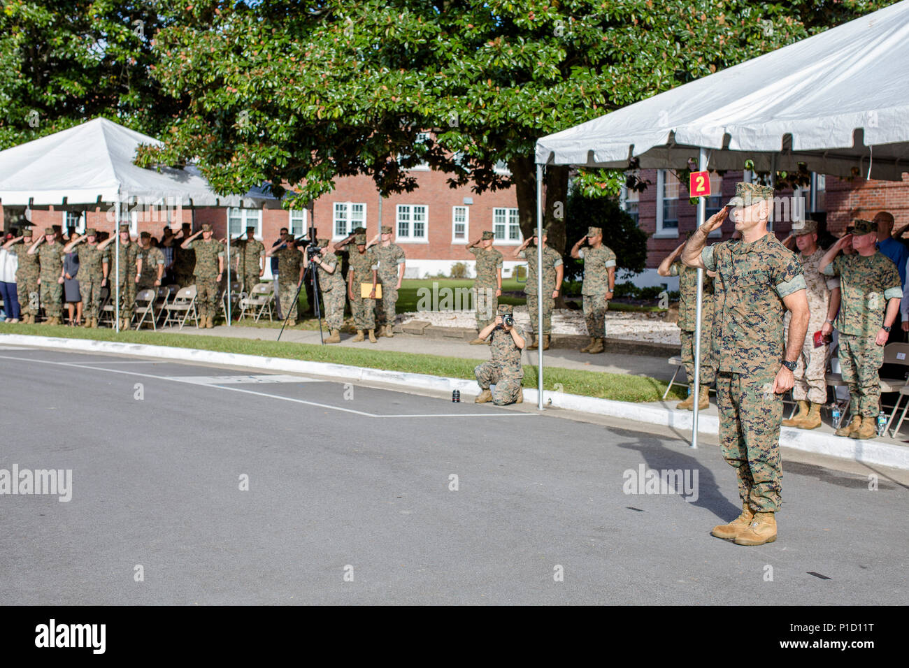 U.S. Marines, Sailors and guests, render honors to Maj. John K. Love ...