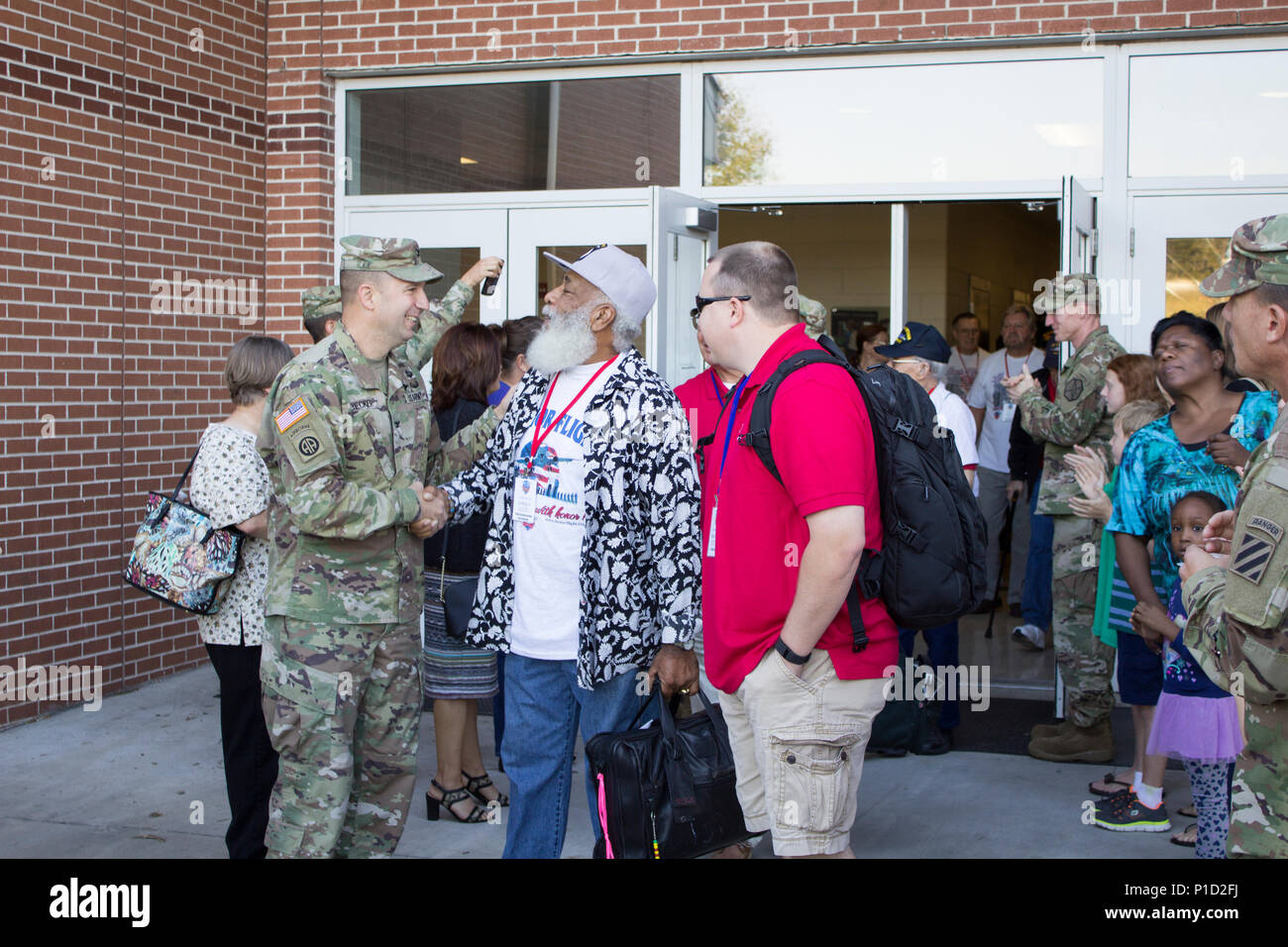 3rd Combat Aviation Brigade commander, Col. Jeffrey A. Becker shakes ...