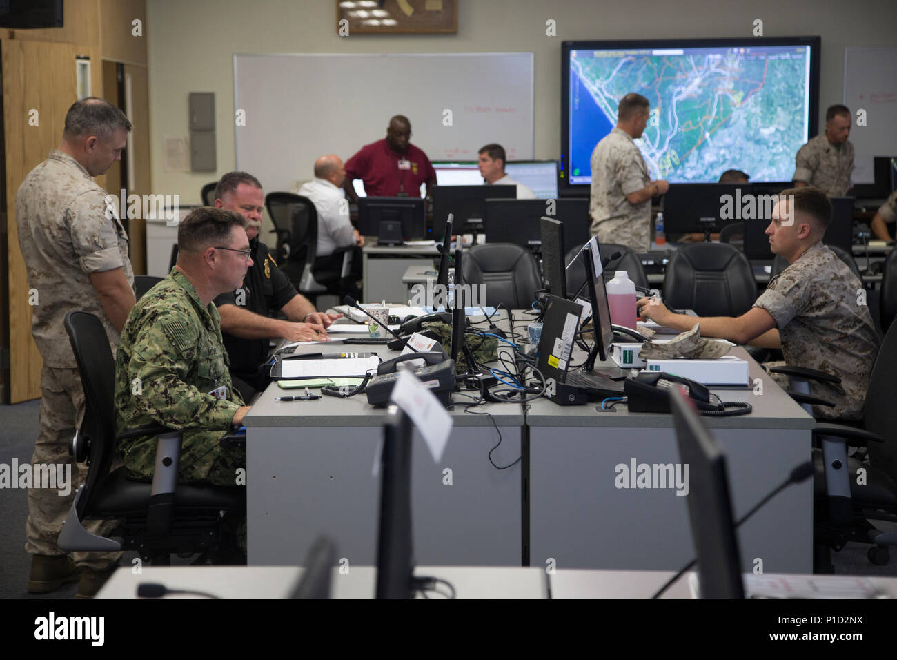 U.S. Marines, Sailors, and civilians with Marine Corps Installations ...
