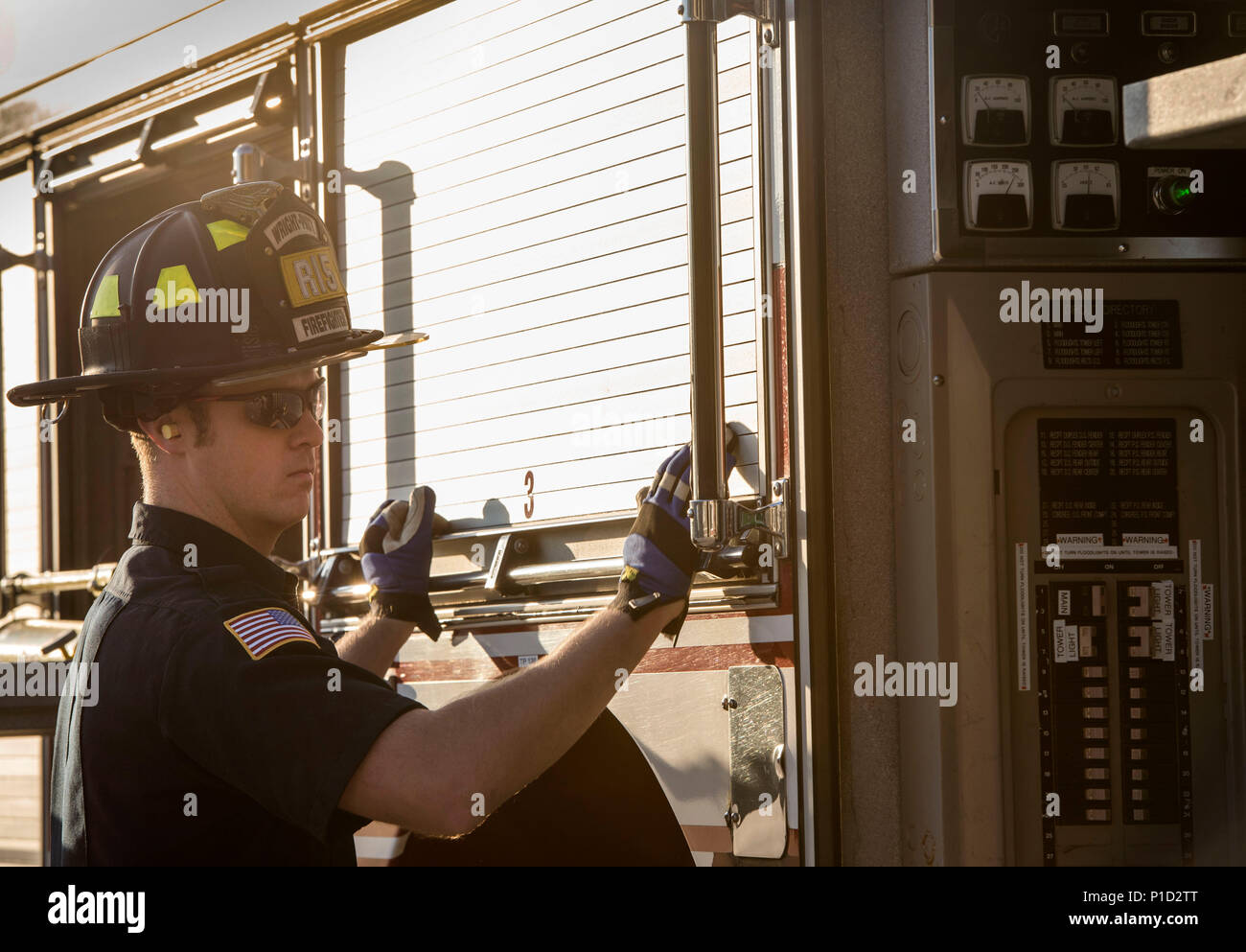 Aron Chaney, 788th Civil Engineer Squadron firefighter, closes the roll ...