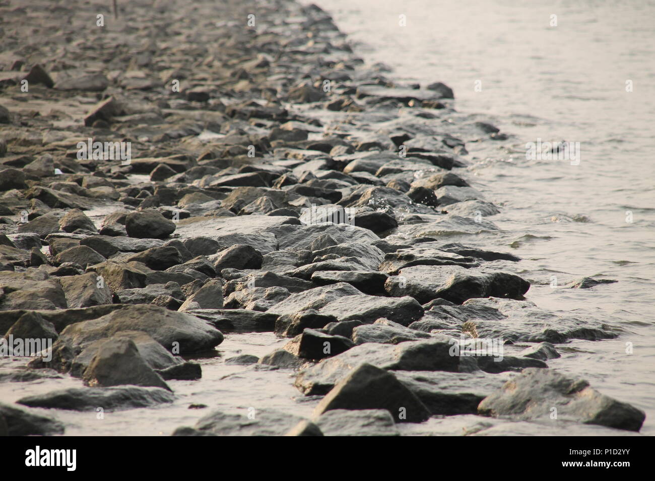 Water Splash on Stones Wallpaper Stock Photo - Alamy