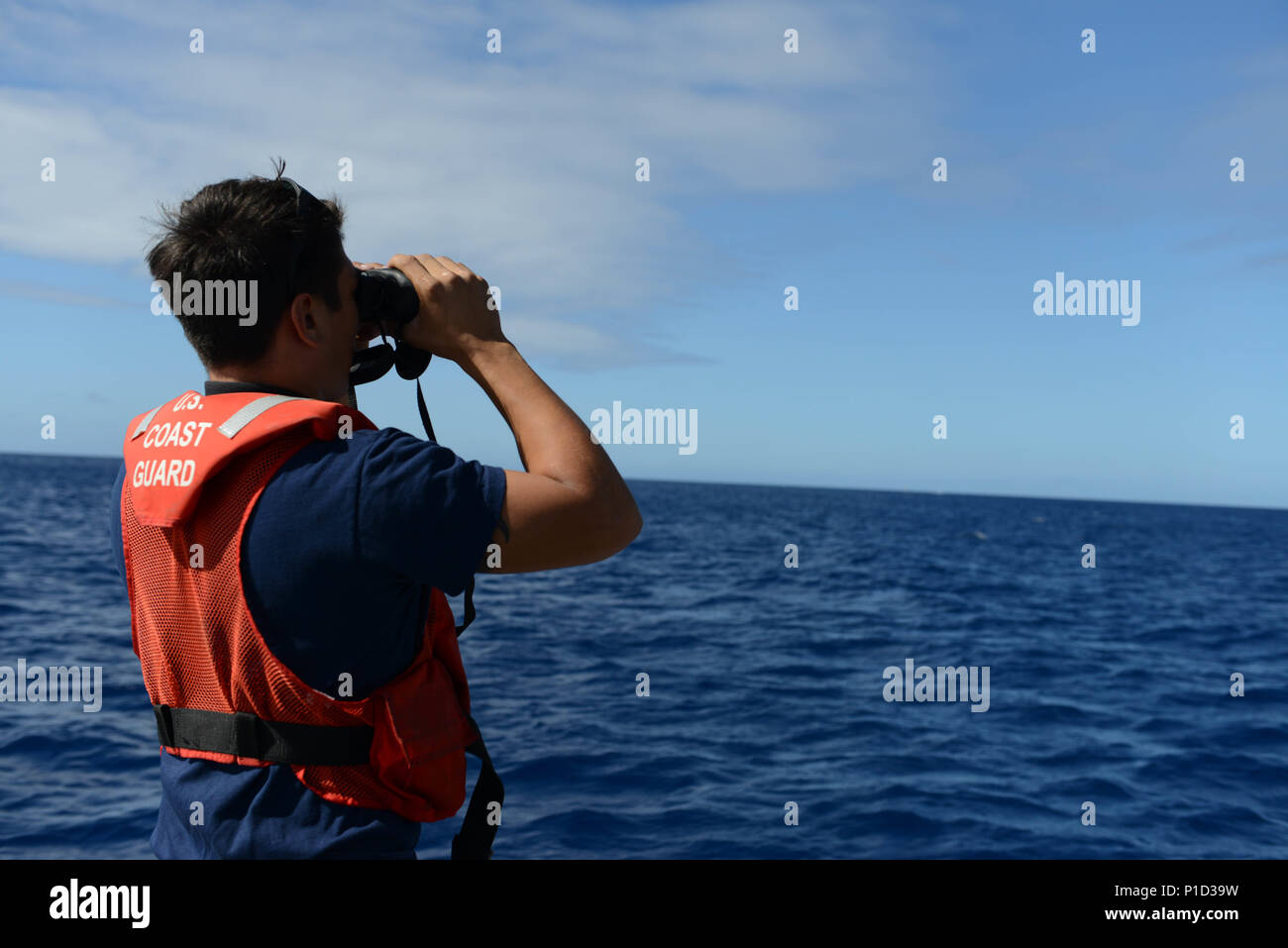 U.S. Coast Guard Fireman Tristen Otto, a crewmember at Coast Guard ...
